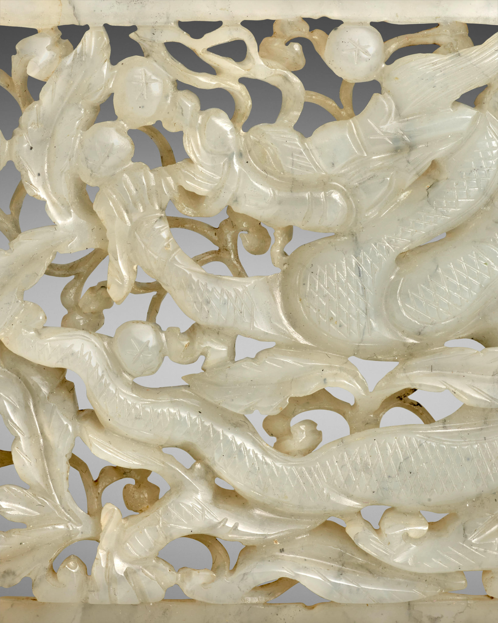 An openwork white jade dragon plaque, Early Ming dynasty, 15th century ...