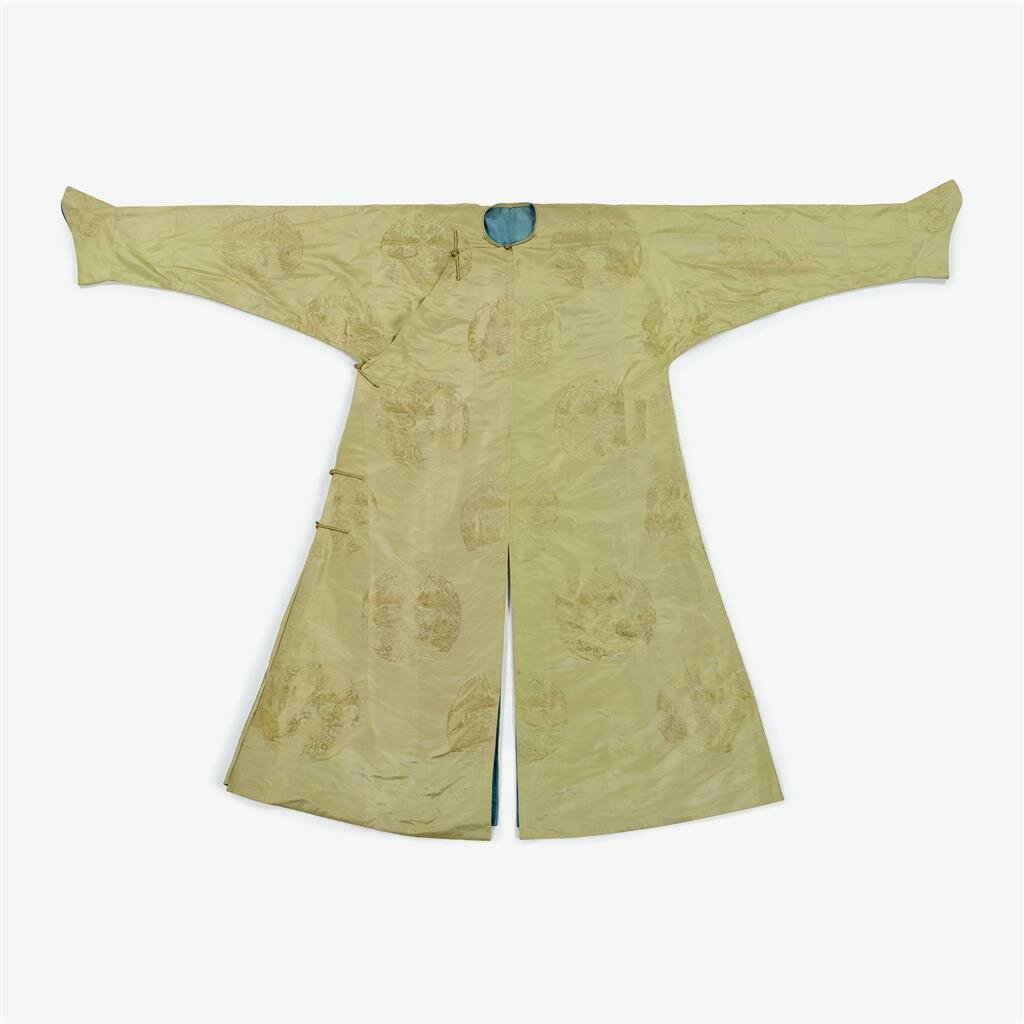 A Chinese lime green brocade silk robe decorated with landscape ...
