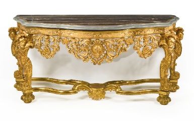 An important Dutch Baroque carved giltwood console table, after designs ...