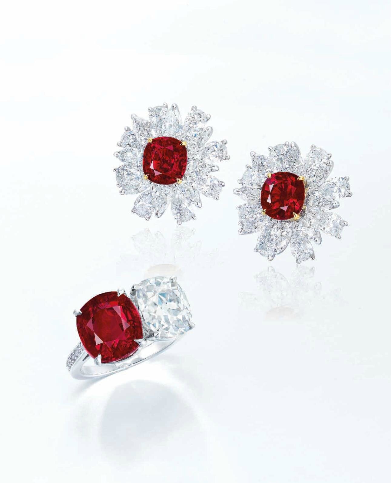 A 7.02 carats Burma ruby and 3.66 carats diamond ring & A pair of 3.53 ...