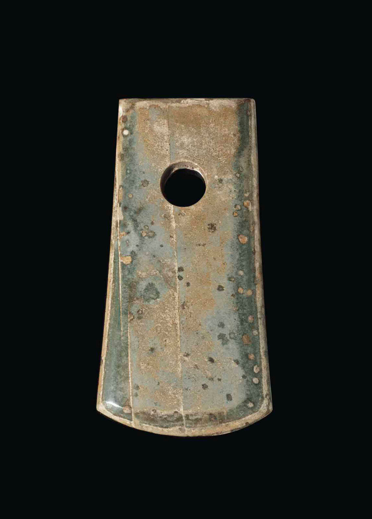 A greenish-grey stone axe, Neolithic period, circa 4th-3rd millennium ...