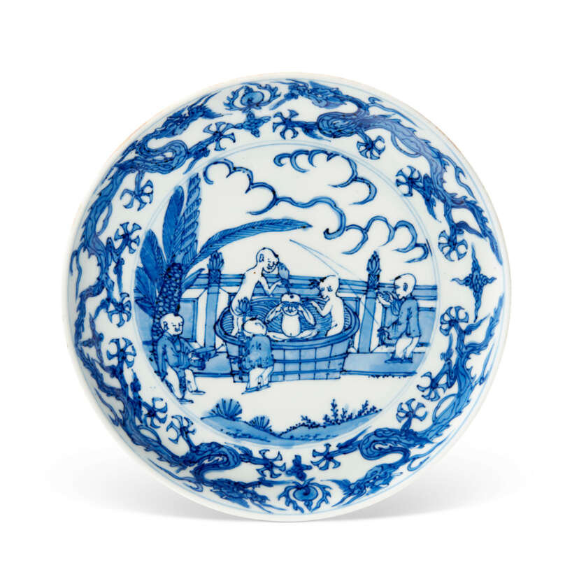 A rare blue and white 'boys’ dish, Wanli six-character mark and of the ...