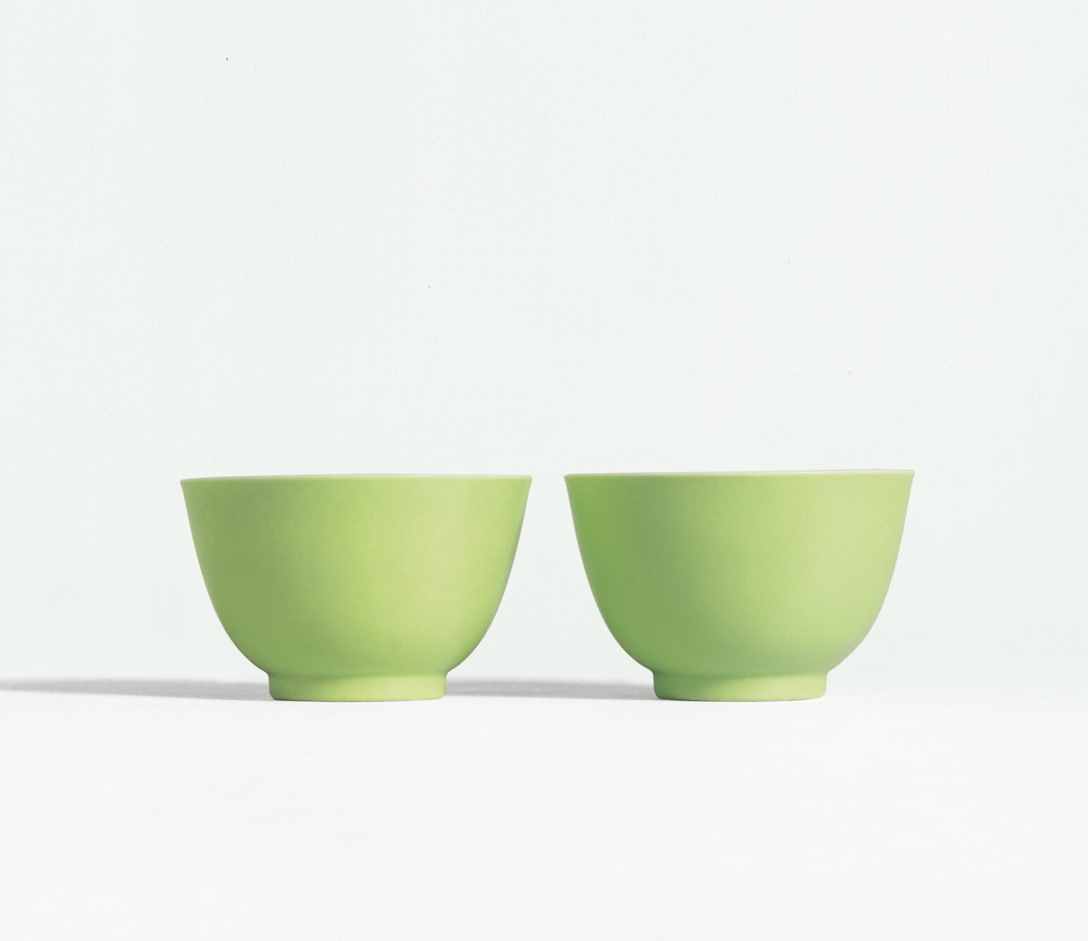A fine and rare pair of lime-green cups, Marks and period of Yongzheng ...