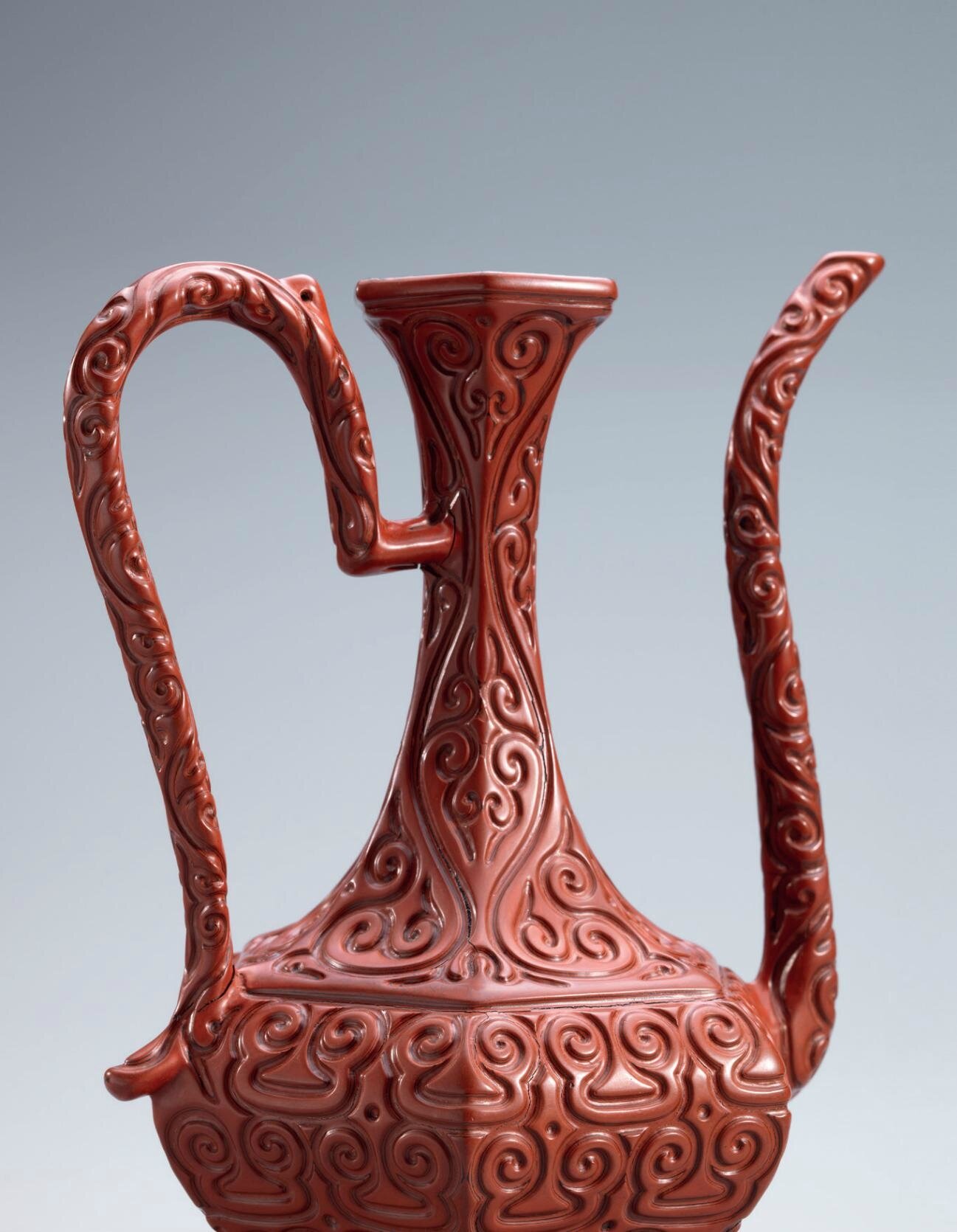 A highly important cinnabar tixi lacquer hexagonal ewer, Jiajing ...