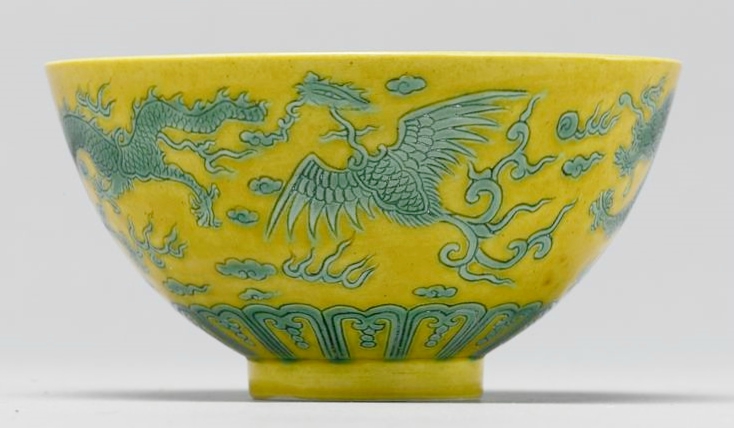 An incised green and yellow 'Dragon and Phoenix' bowl, Daoguang seal ...