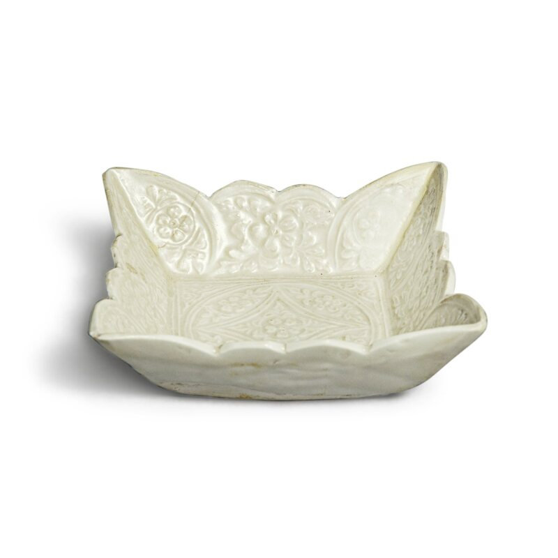 A molded white-glazed 'floral' square dish, Liao dynasty (907-1125 ...