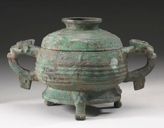 An archaic bronze ritual food vessel and cover (gui), Late Western Zhou Dynasty, 9th-8th century ...