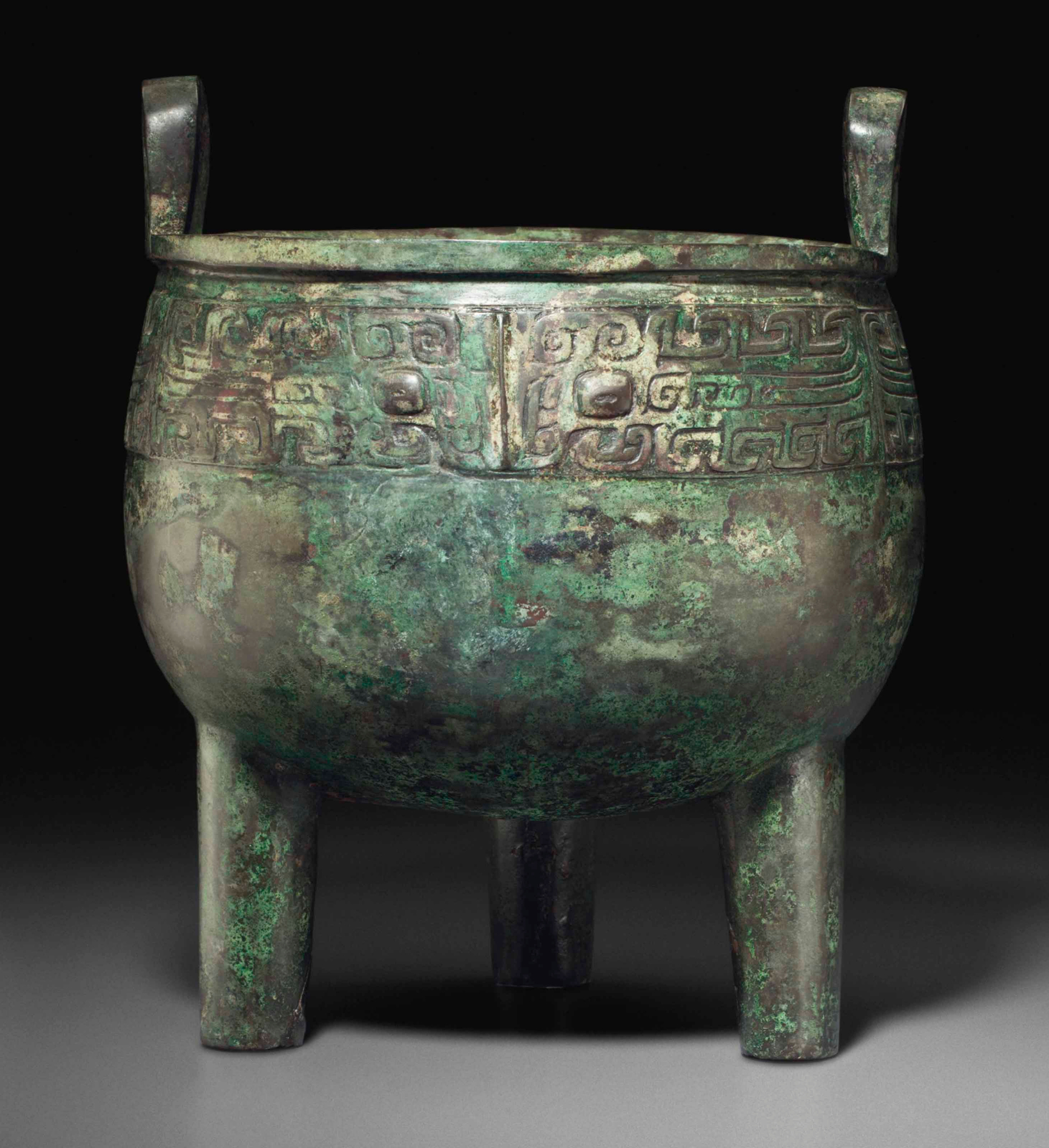 A large bronze ritual tripod food vessel, Ding, Late Shang-Western Zhou dynasty, 11th century BC ...
