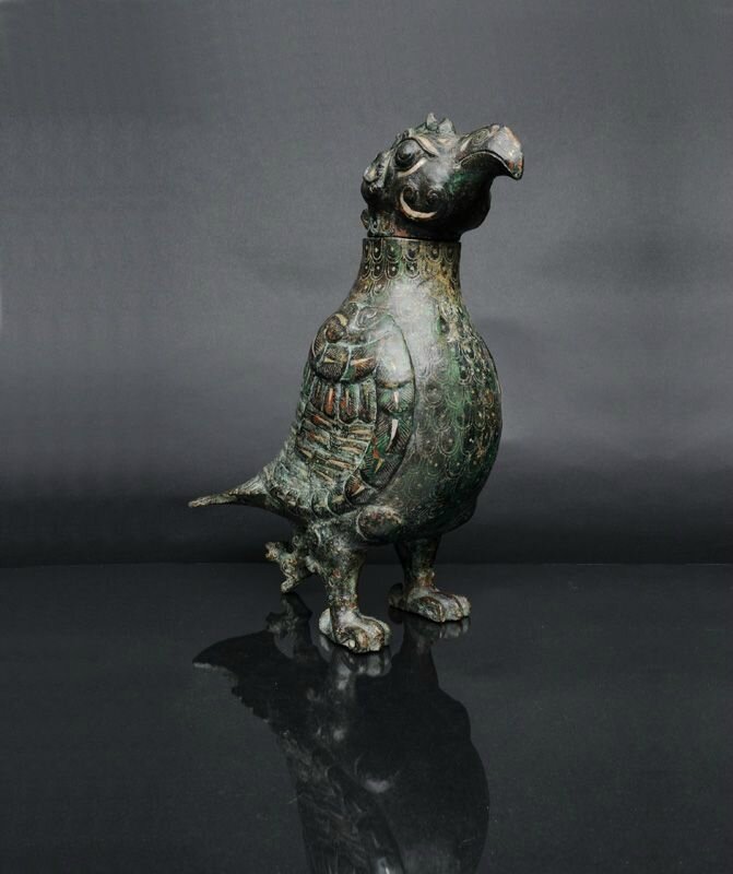 A very rare and important ritual bronze vessel in the shape of a bird ...