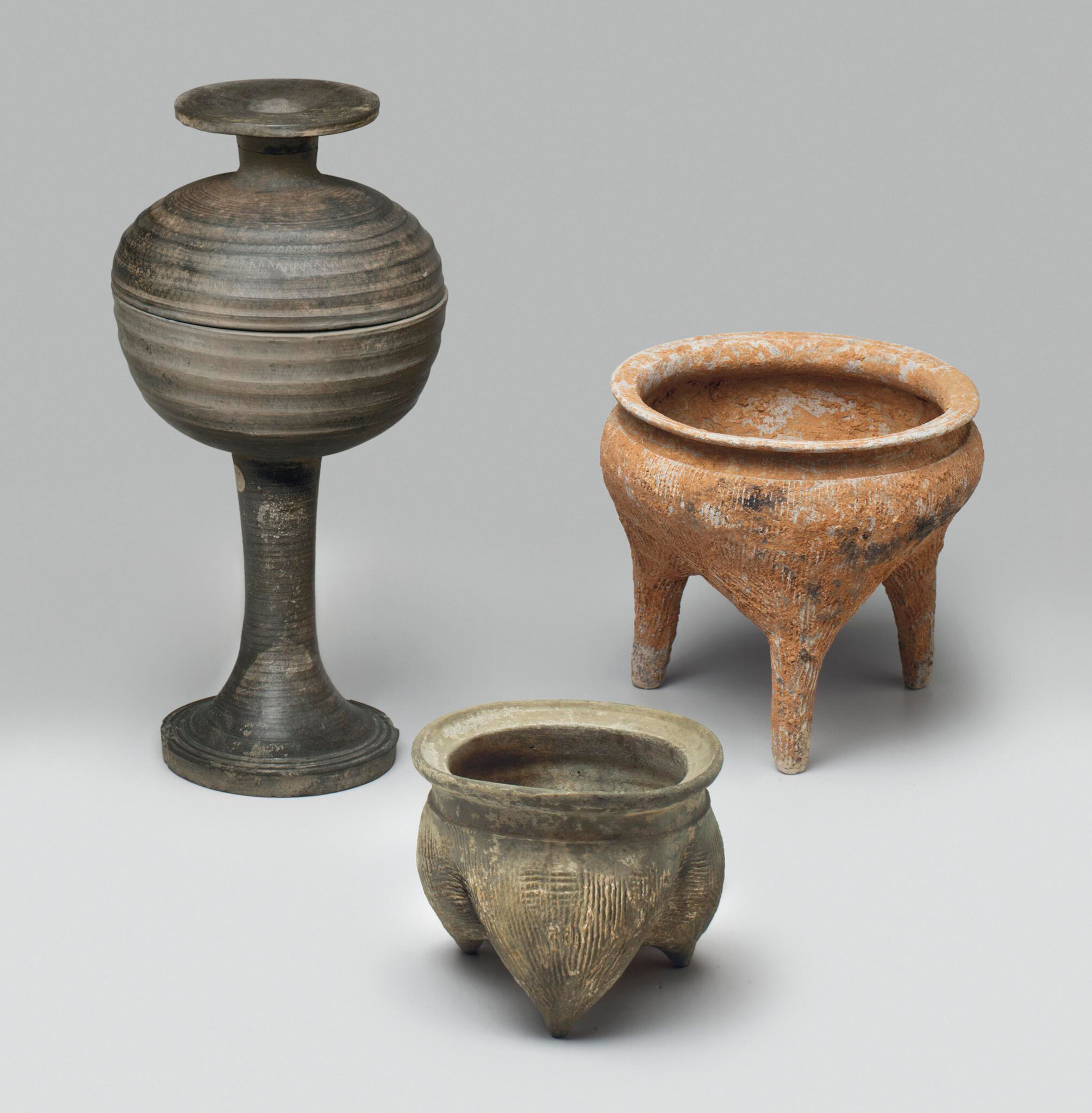 Three early pottery vessels, Neolithic-Eastern Zhou dynasty, 3rd ...